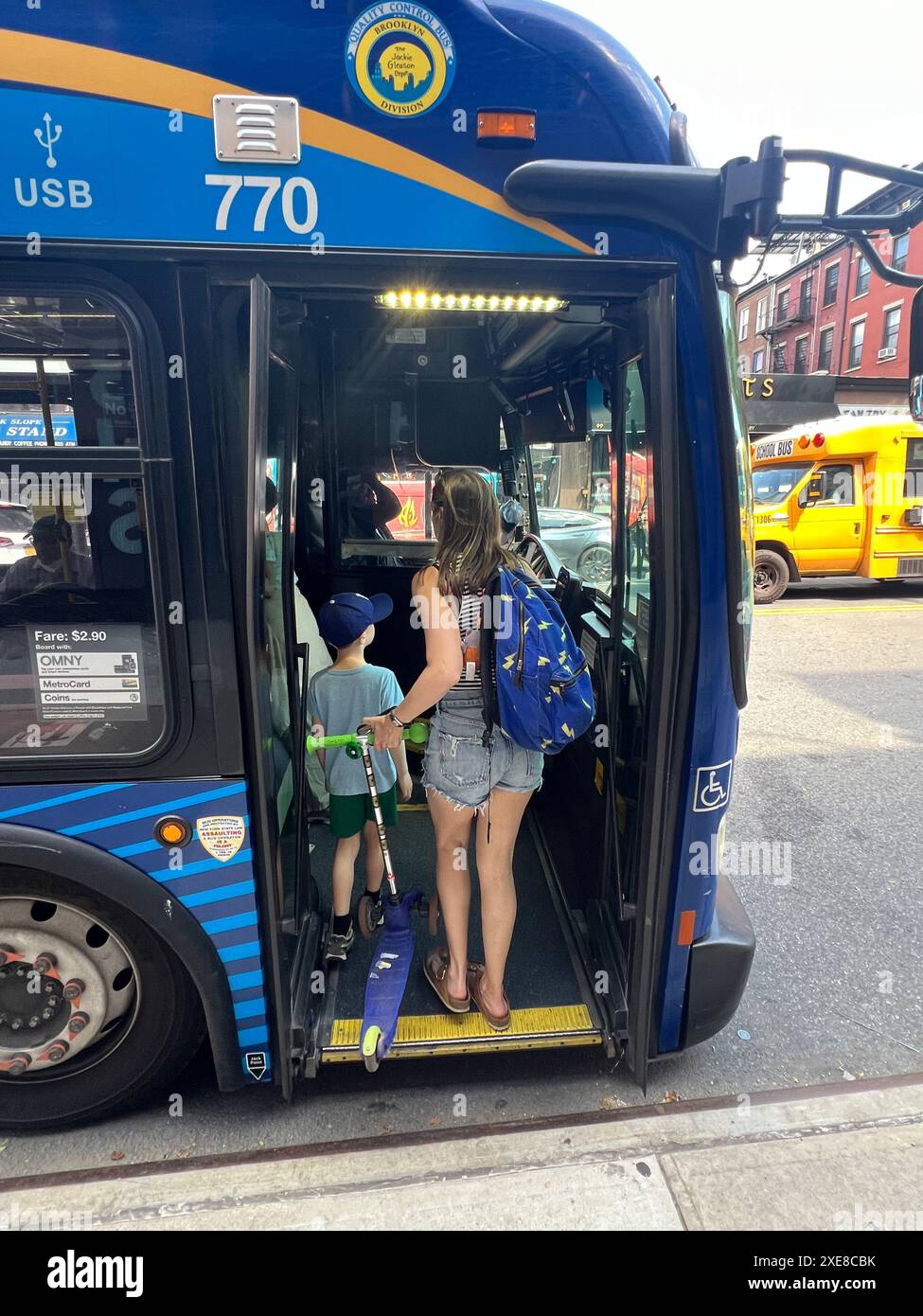 Mother son on bus stop hi-res stock photography and images - Alamy