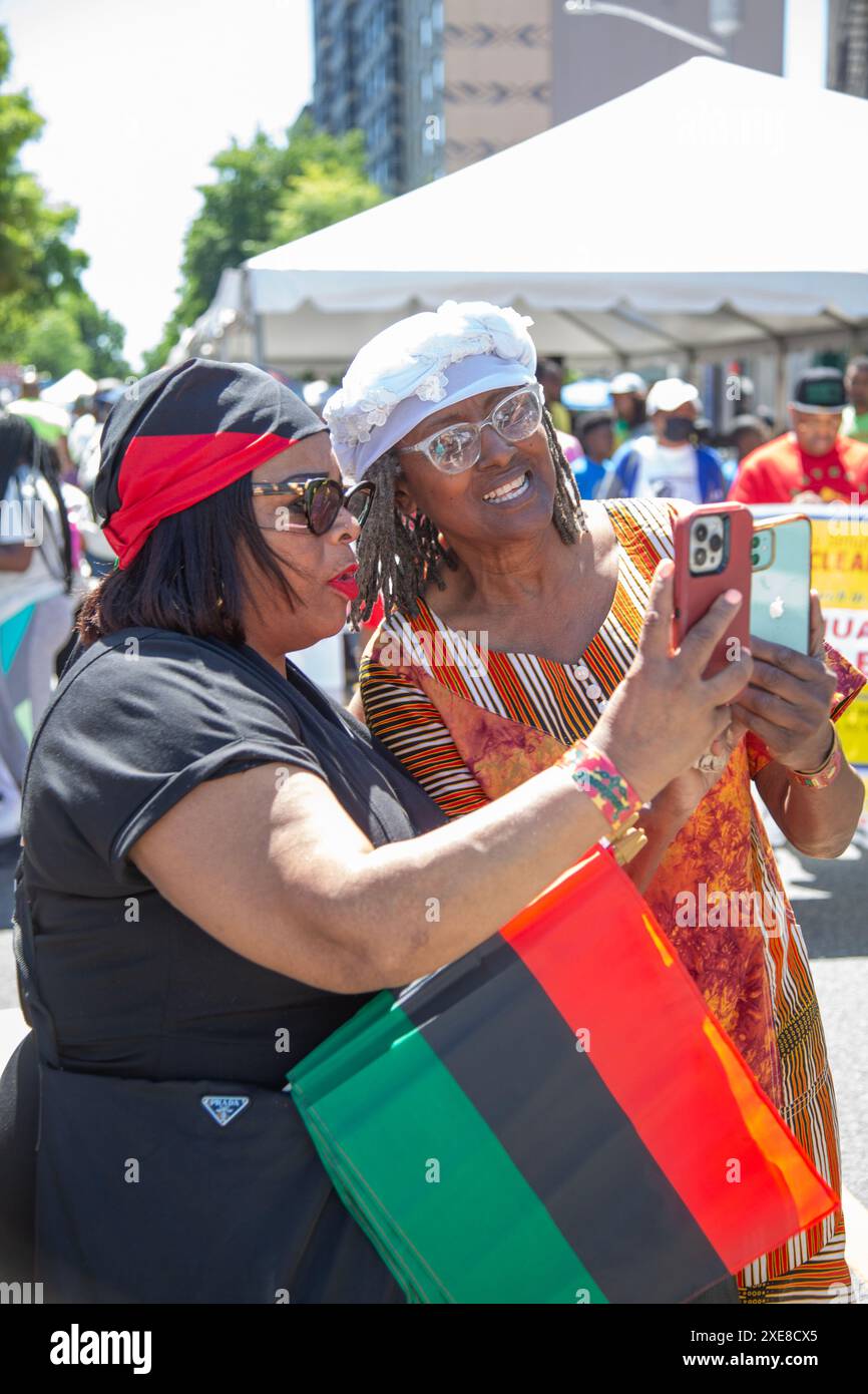 Juneteenth Parade and festival on 116th Street and Malcolm X Blvd in ...