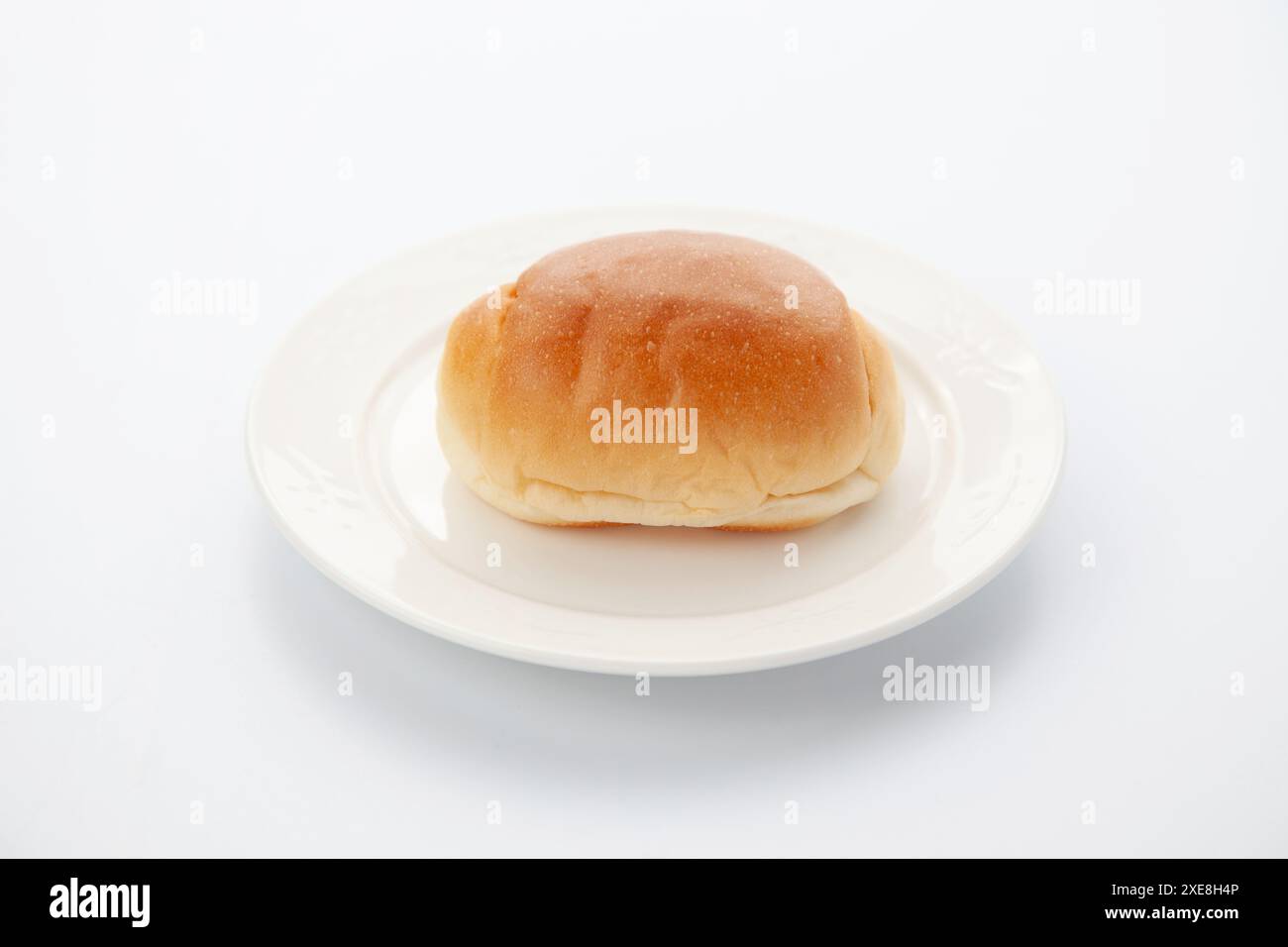 butter bread table roll on plate isolated on white background Stock ...