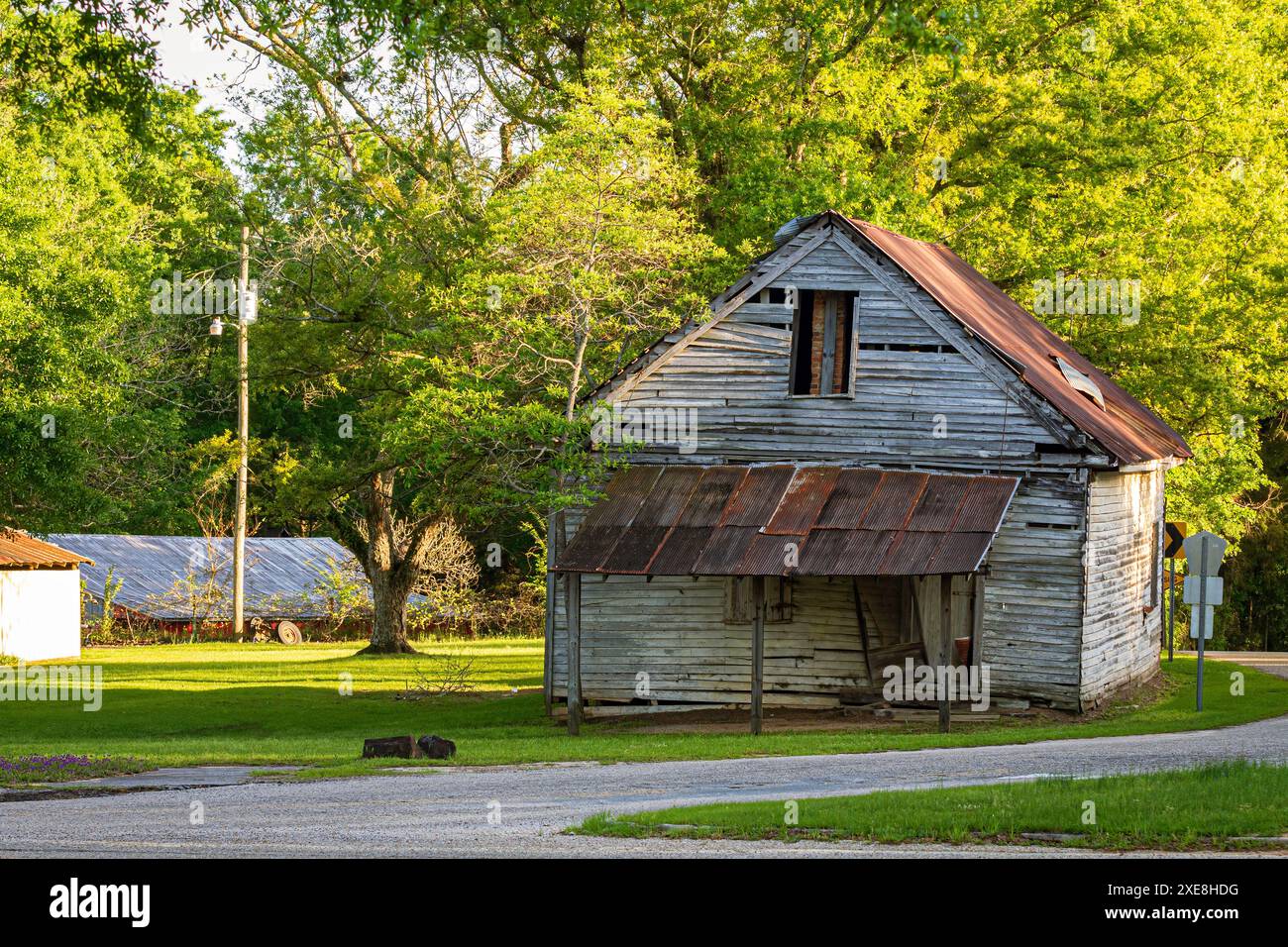 An old dilapidated wooden house from days gone by in rural southern ...