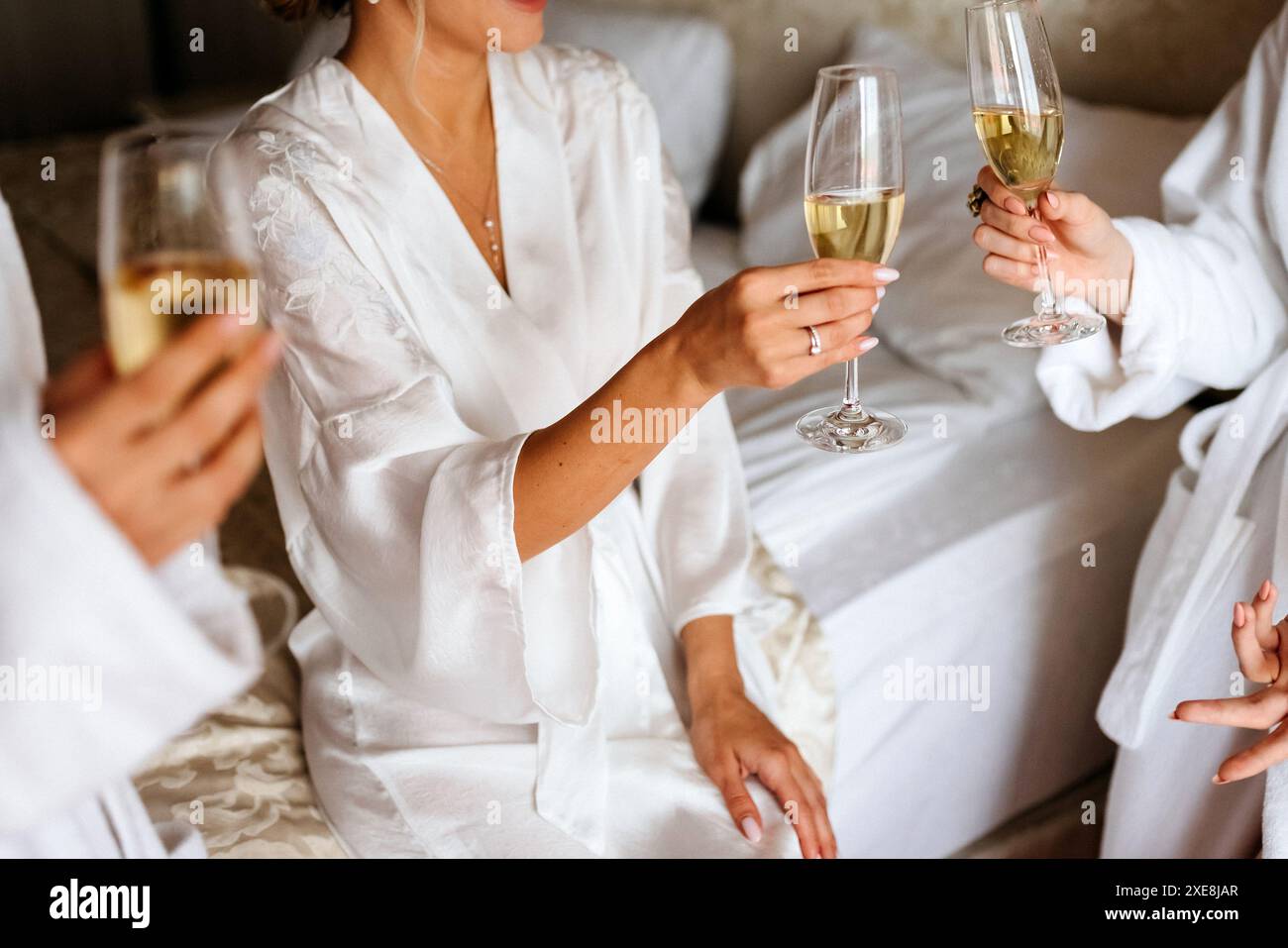 Beautiful Women Friends In Robes Having Fun At Bachelorette Party Stock ...