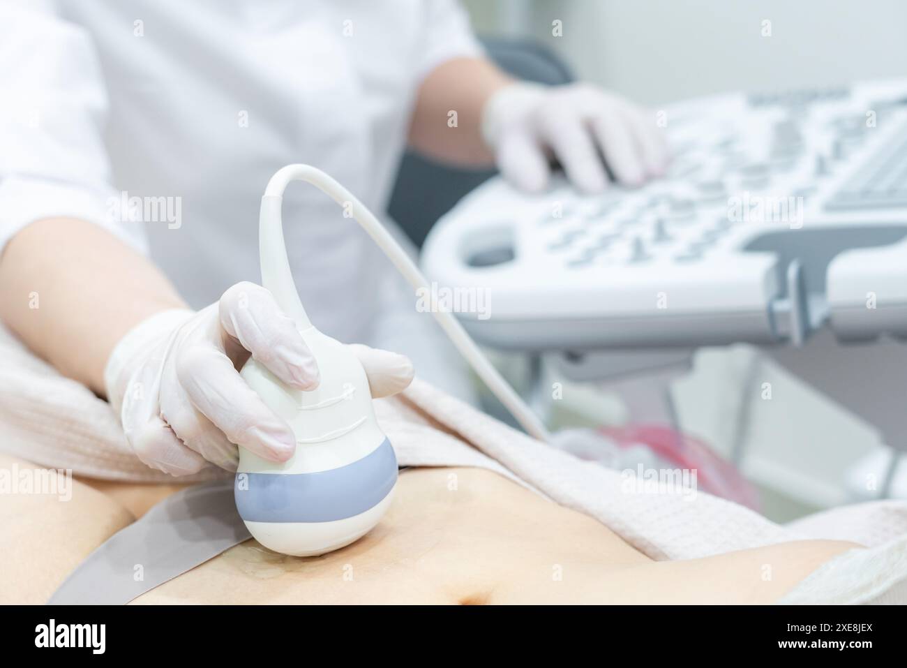 Gynecologist doing ultrasound scan in modern clinic Stock Photo - Alamy