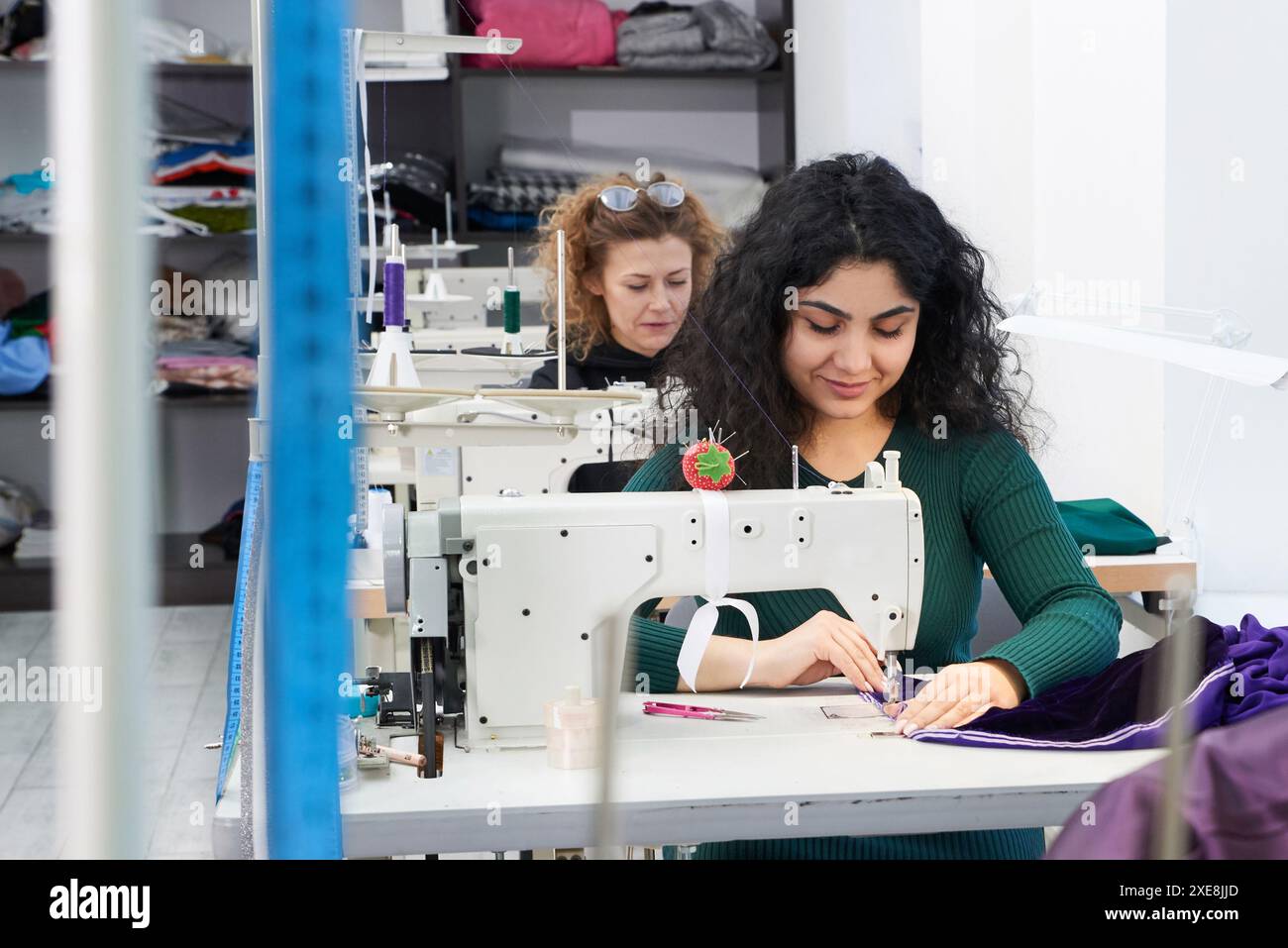 Hand sewing clothes hi-res stock photography and images - Alamy