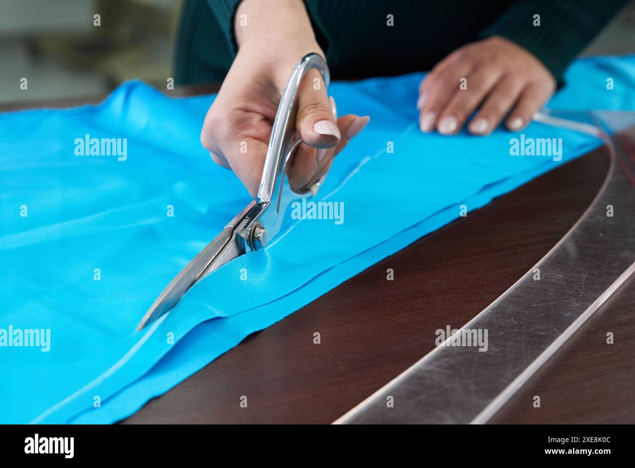 Woman hands cutting fabric scissors hi-res stock photography and images ...