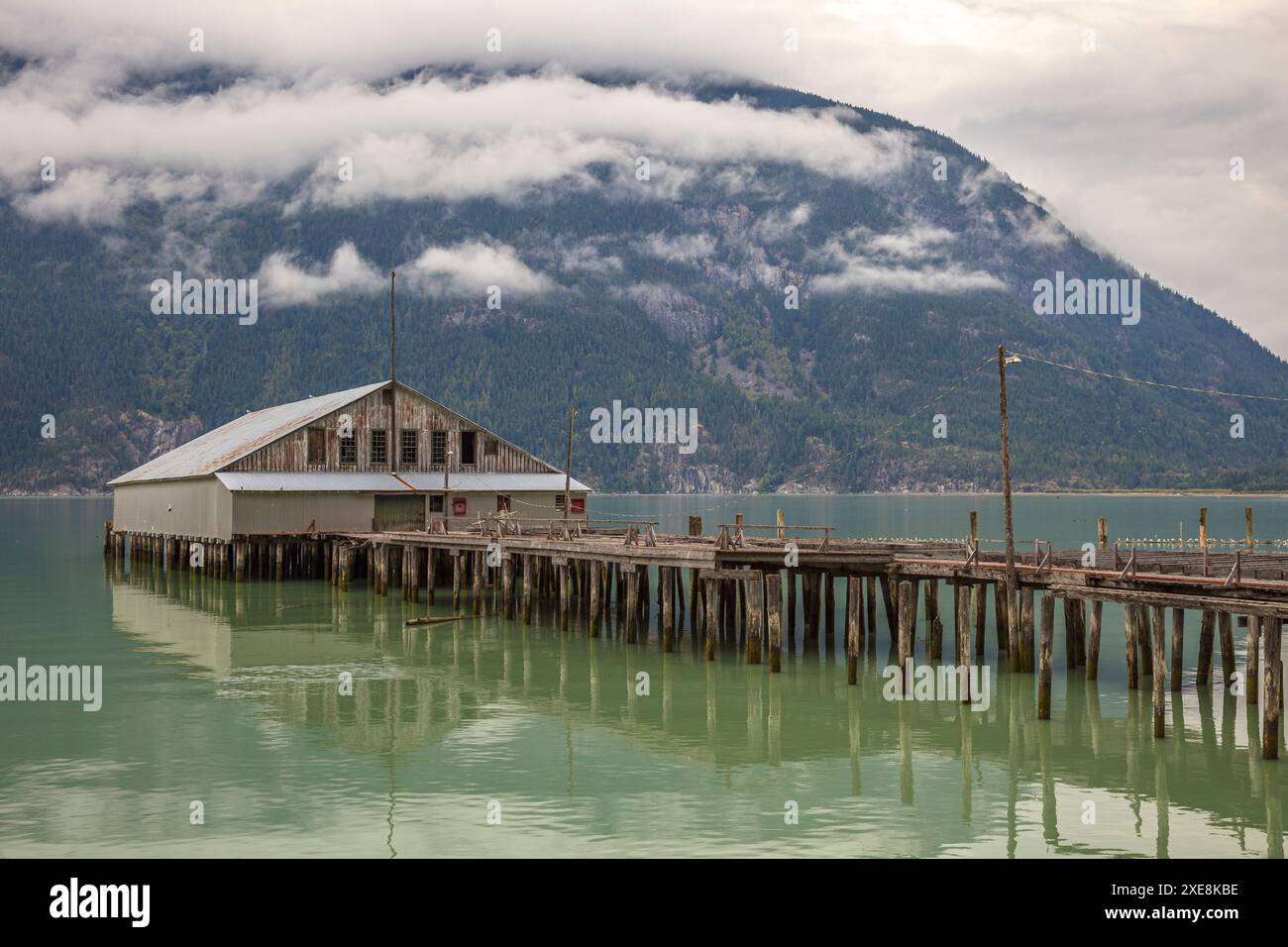 The old abandoned fish cannery on the pier at Bella Coola Stock Photo ...