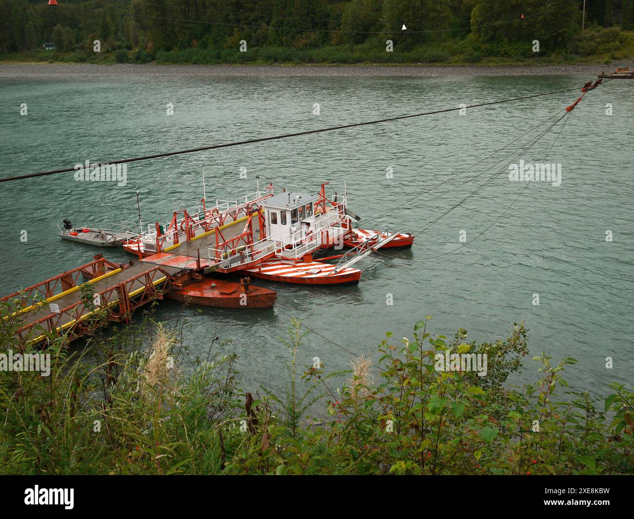The reaction ferry crossing the Skeena River at Usk, British Columbia ...