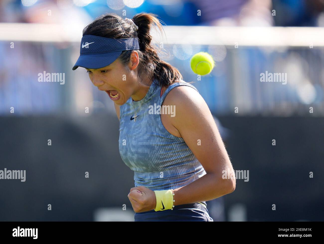Emma Raducanu reacts after winning a point during her match against ...