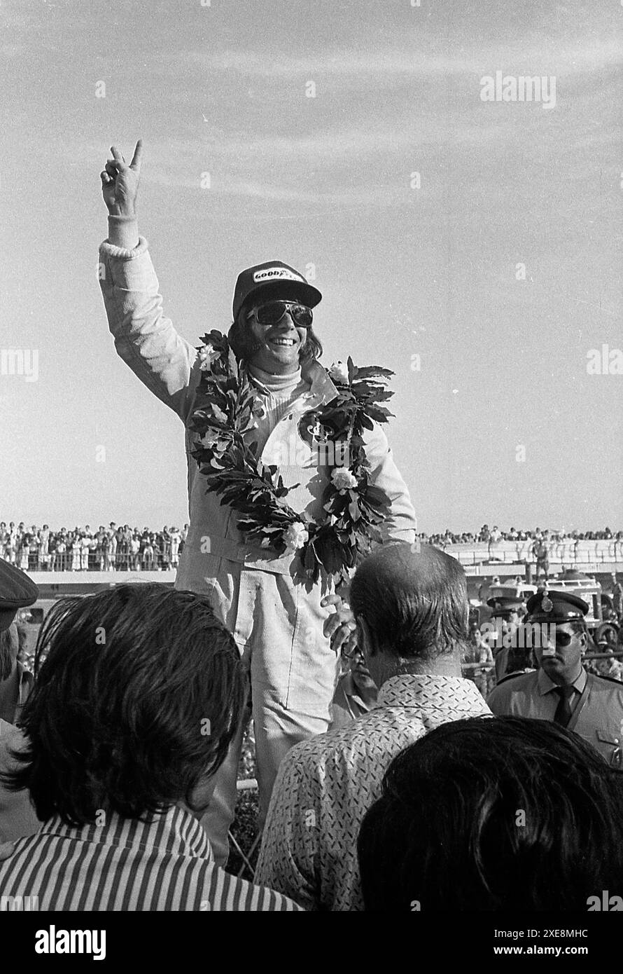 Brazilian car racer Emerson Fittipaldi celebrates his tirumph at the ...
