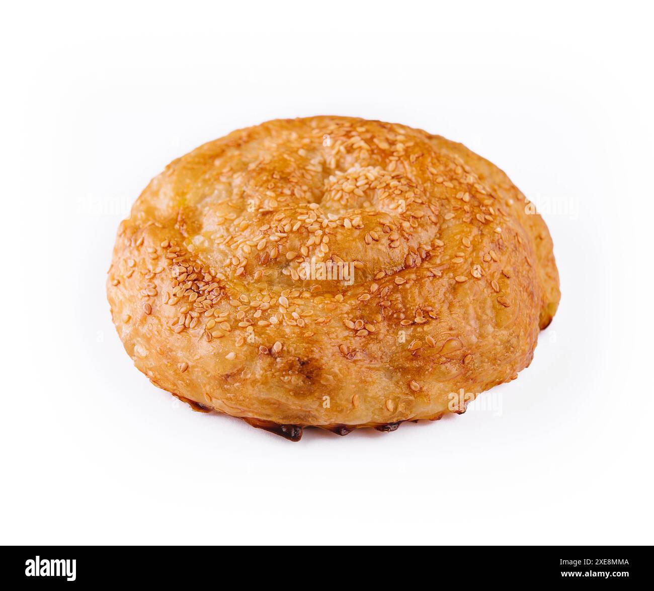 Puff pastry bun rolled up in the form of a snail Stock Photo - Alamy