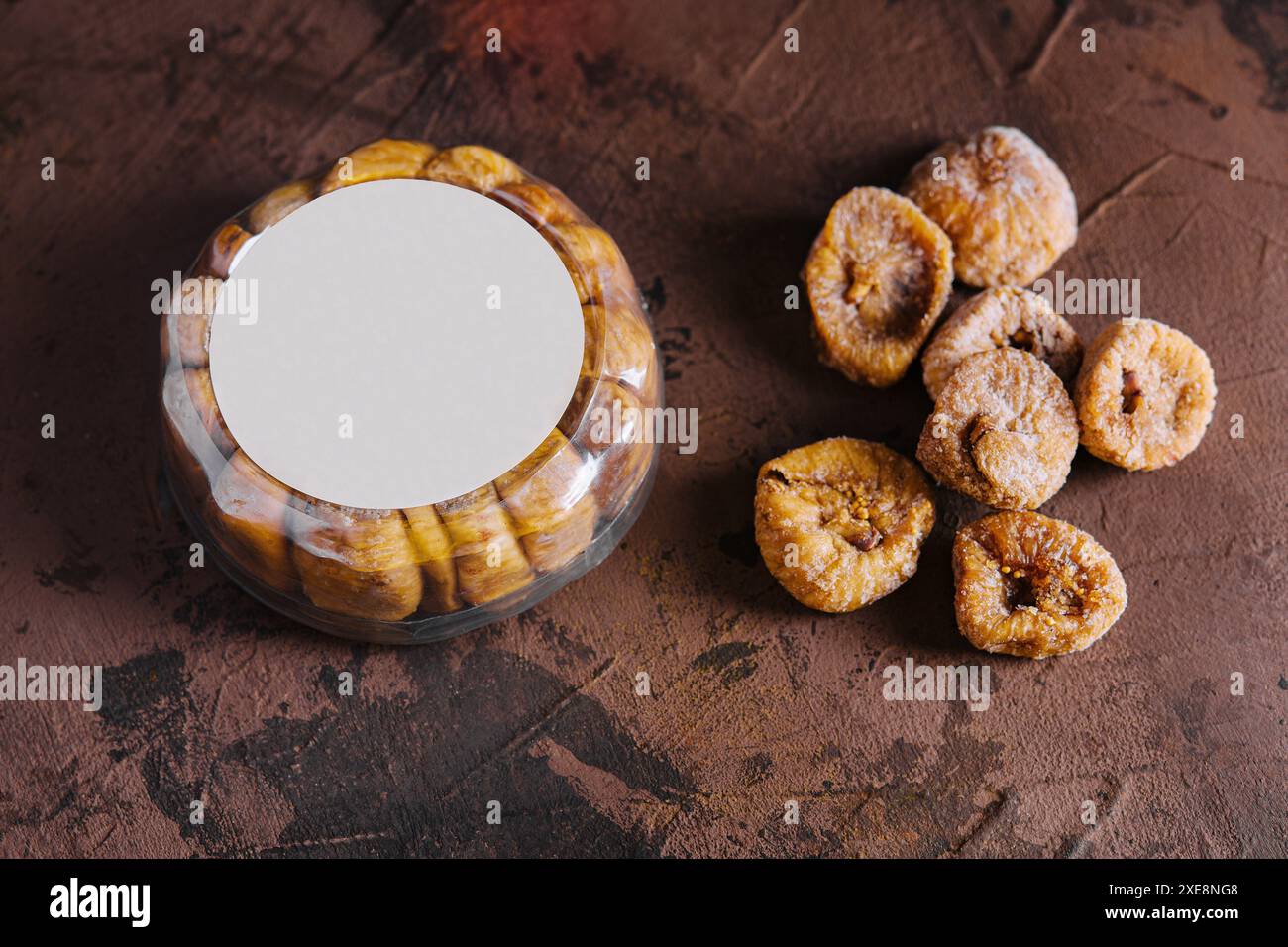 Dried figs in round plastic packaging on top view Stock Photo - Alamy