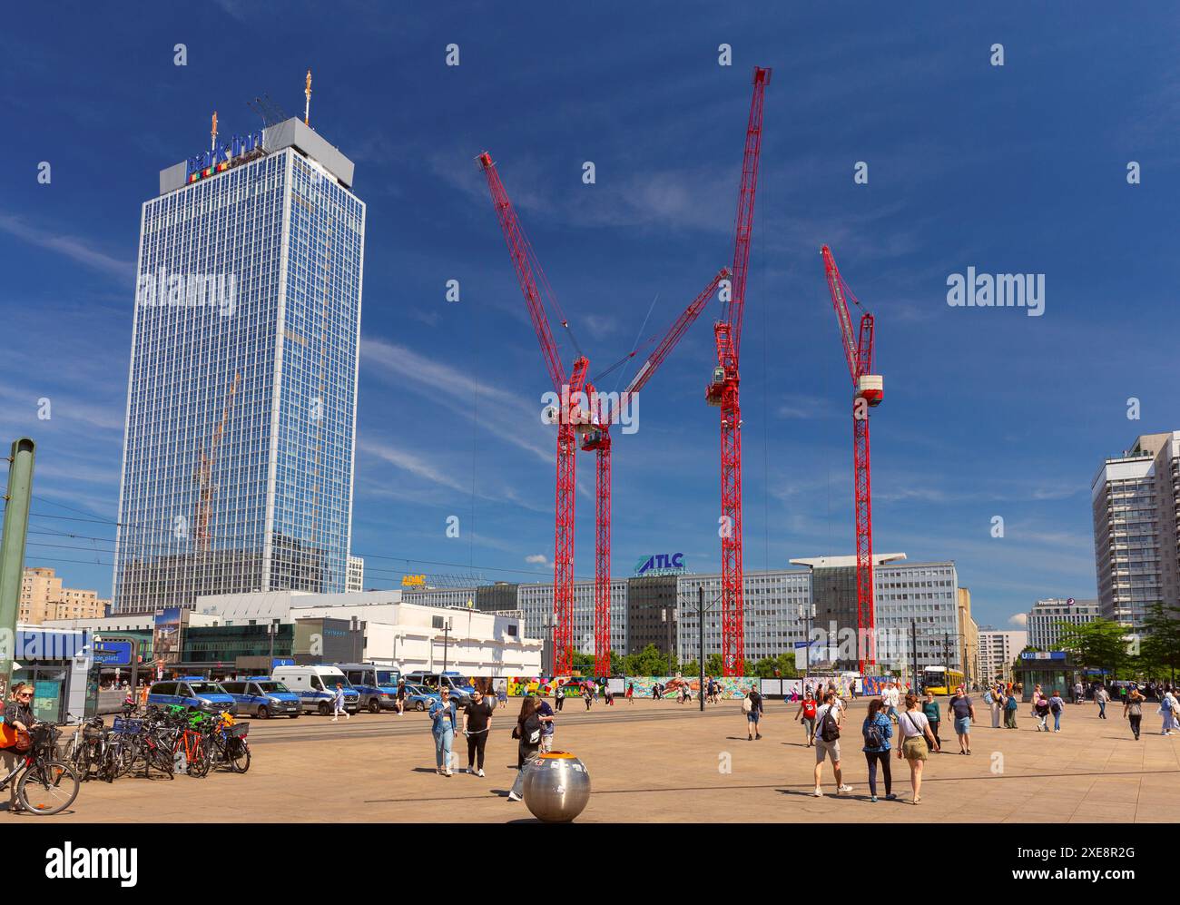 Berlin, Germany - May 21, 2024: Large red industrial cranes are ...