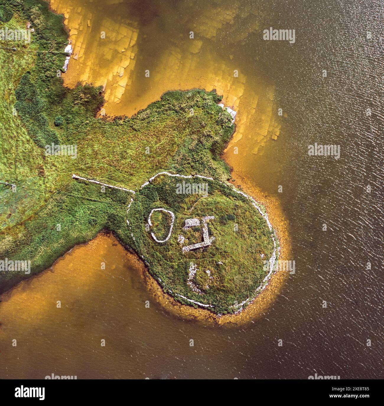 Aerial view of St. Tredwell's chapel, chapel and settlement mound, on a ...