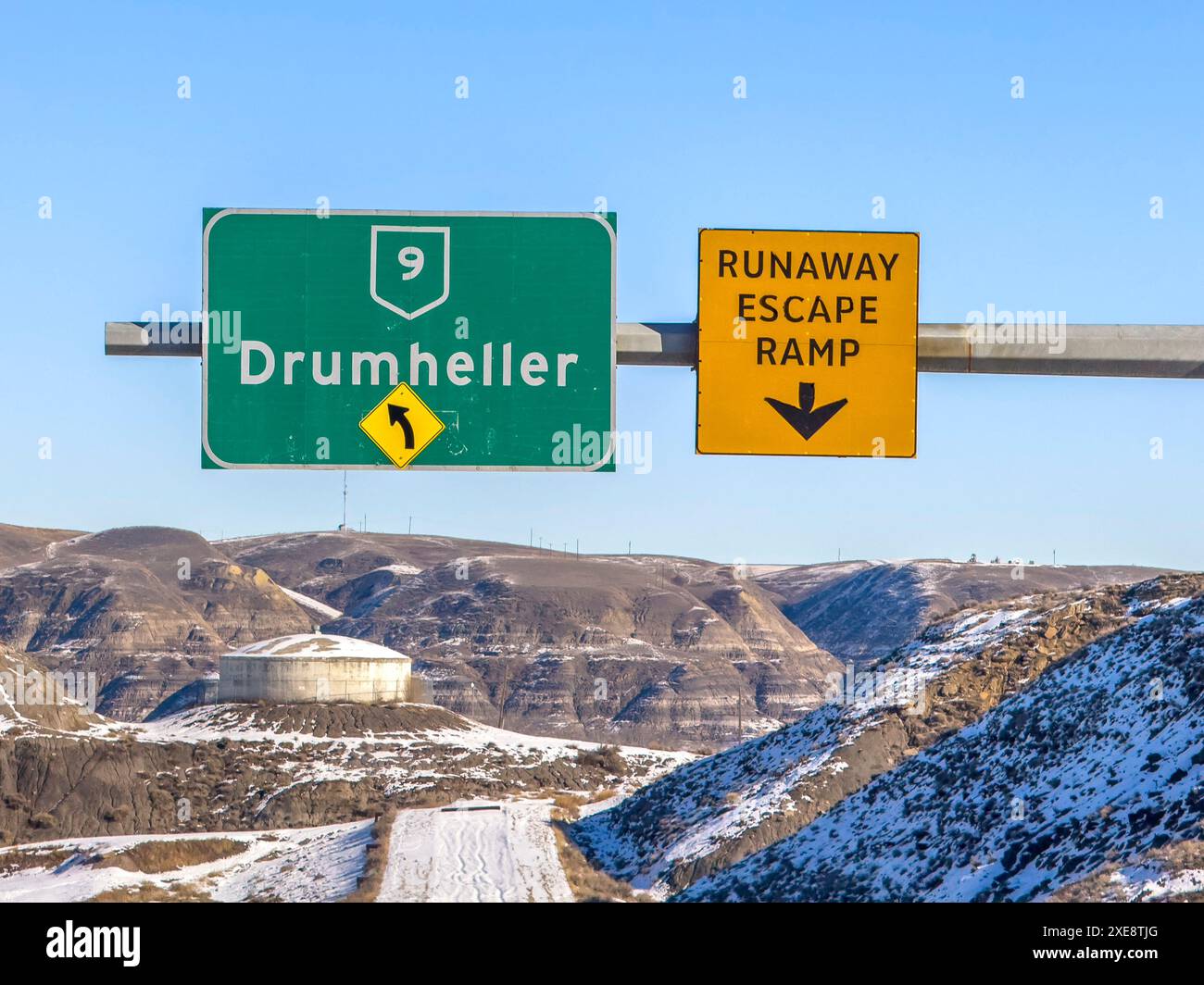 A road sign to the Drumheller town Stock Photo - Alamy