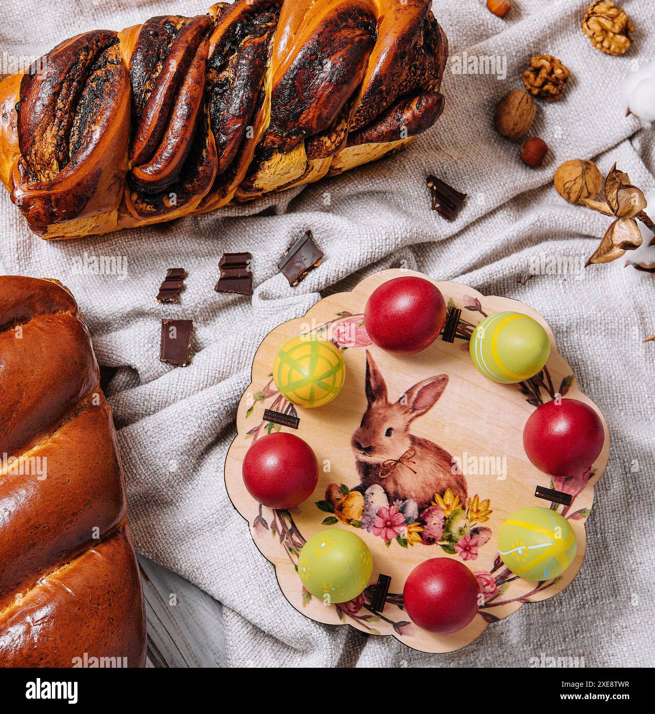 Easter eggs with buns on top view Stock Photo - Alamy