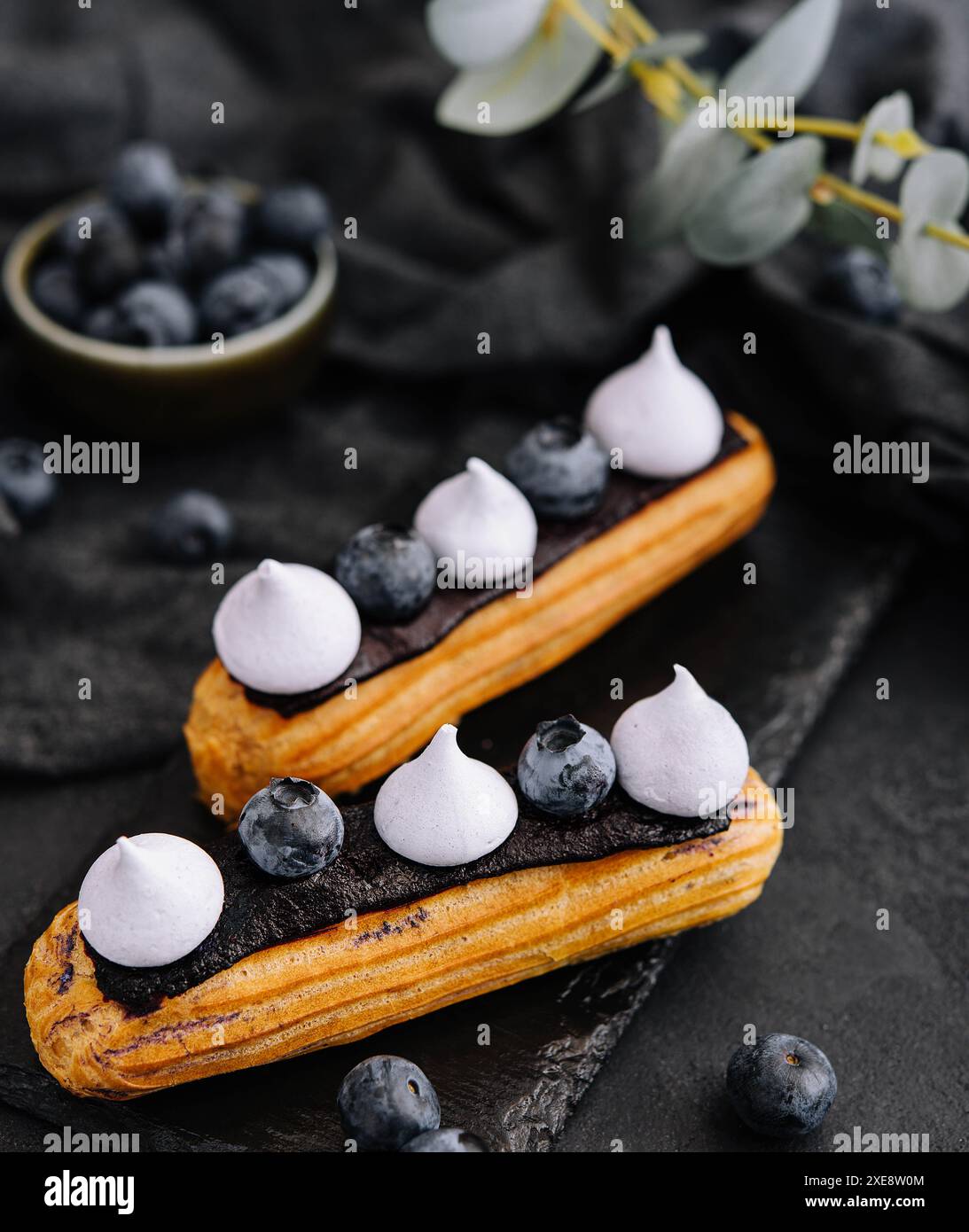 Board sweet chocolate eclairs hi-res stock photography and images - Alamy