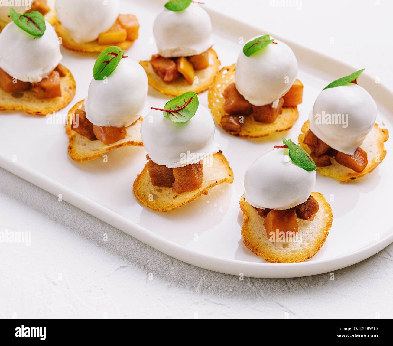 Italian style appetizer on white plate Stock Photo - Alamy