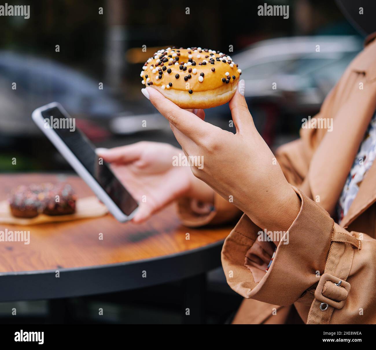 Woman with donuts hi-res stock photography and images - Alamy
