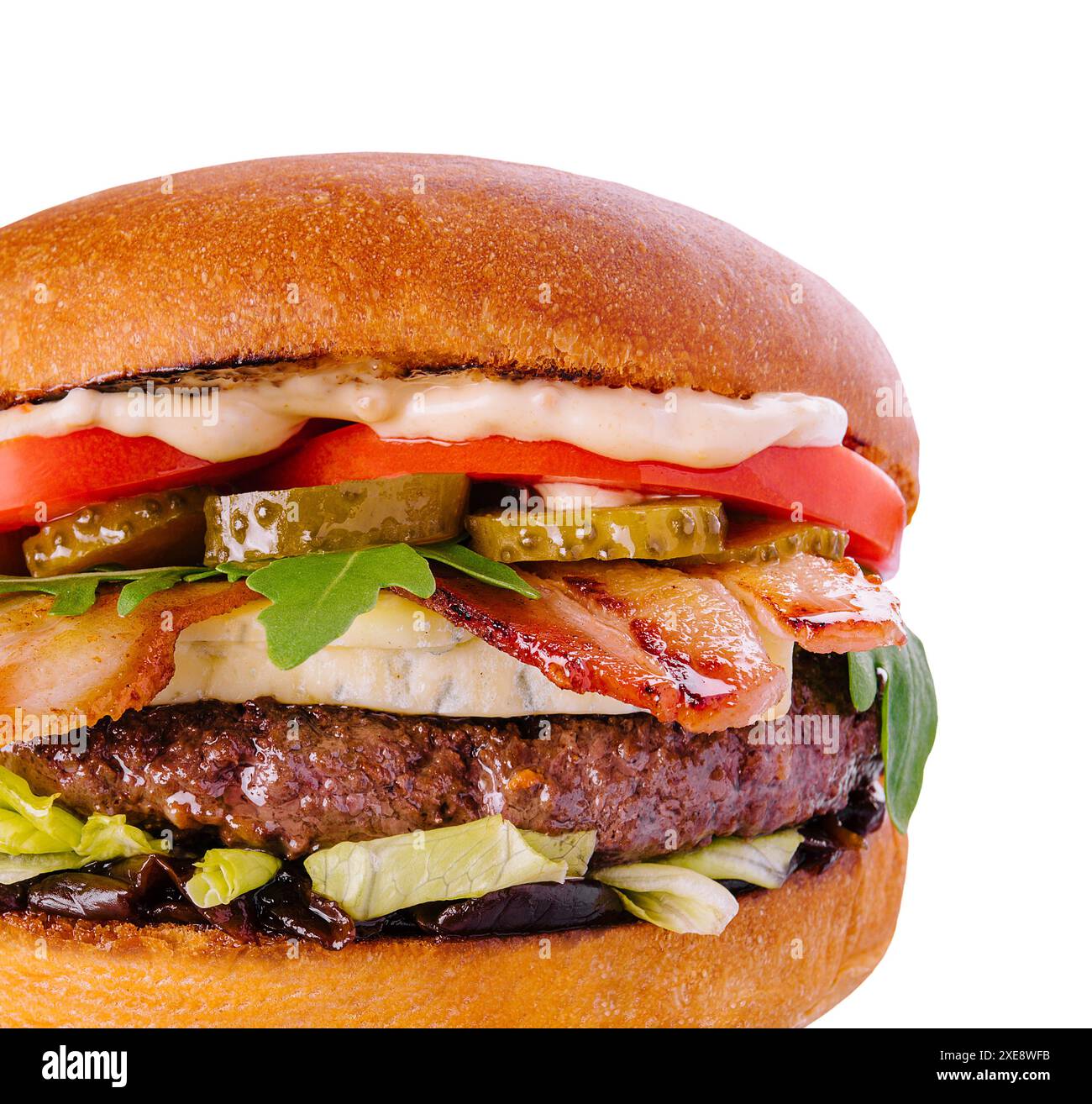 Bacon cheese burger with beef patty tomato cucumber Stock Photo - Alamy