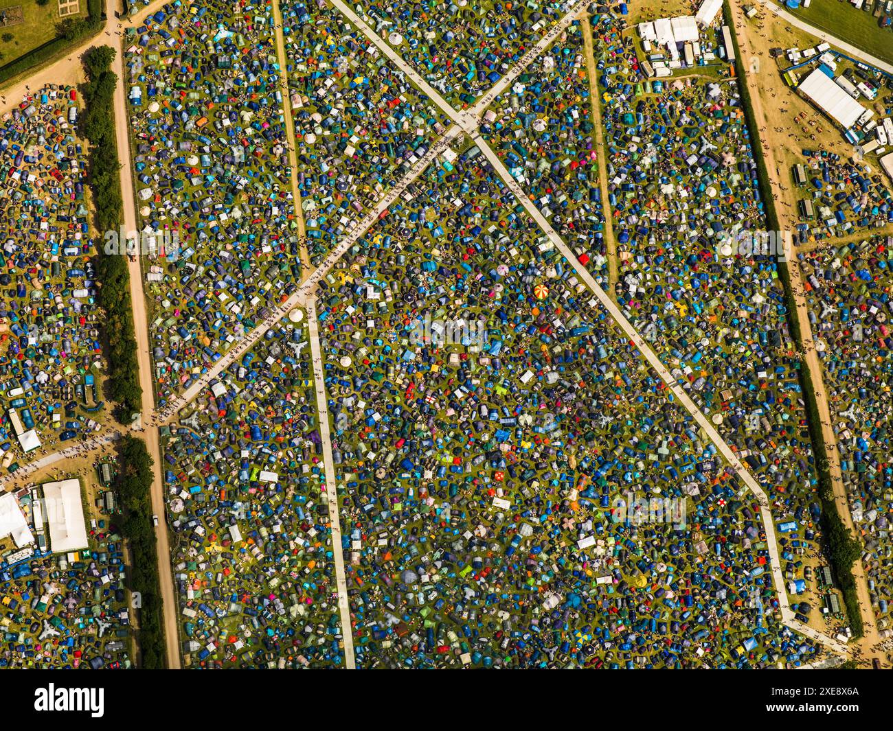Aerial Image Glastonbury Festival, showing colourful mosaic of tents ...