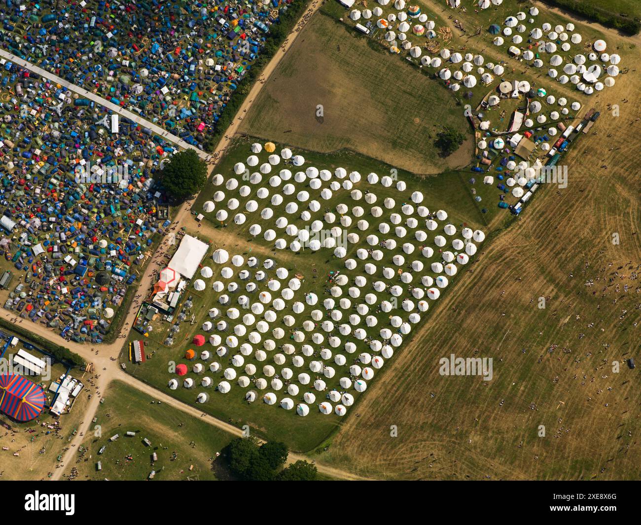 Aerial view Glastonbury Festival, showing glamping bell tents and scout ...