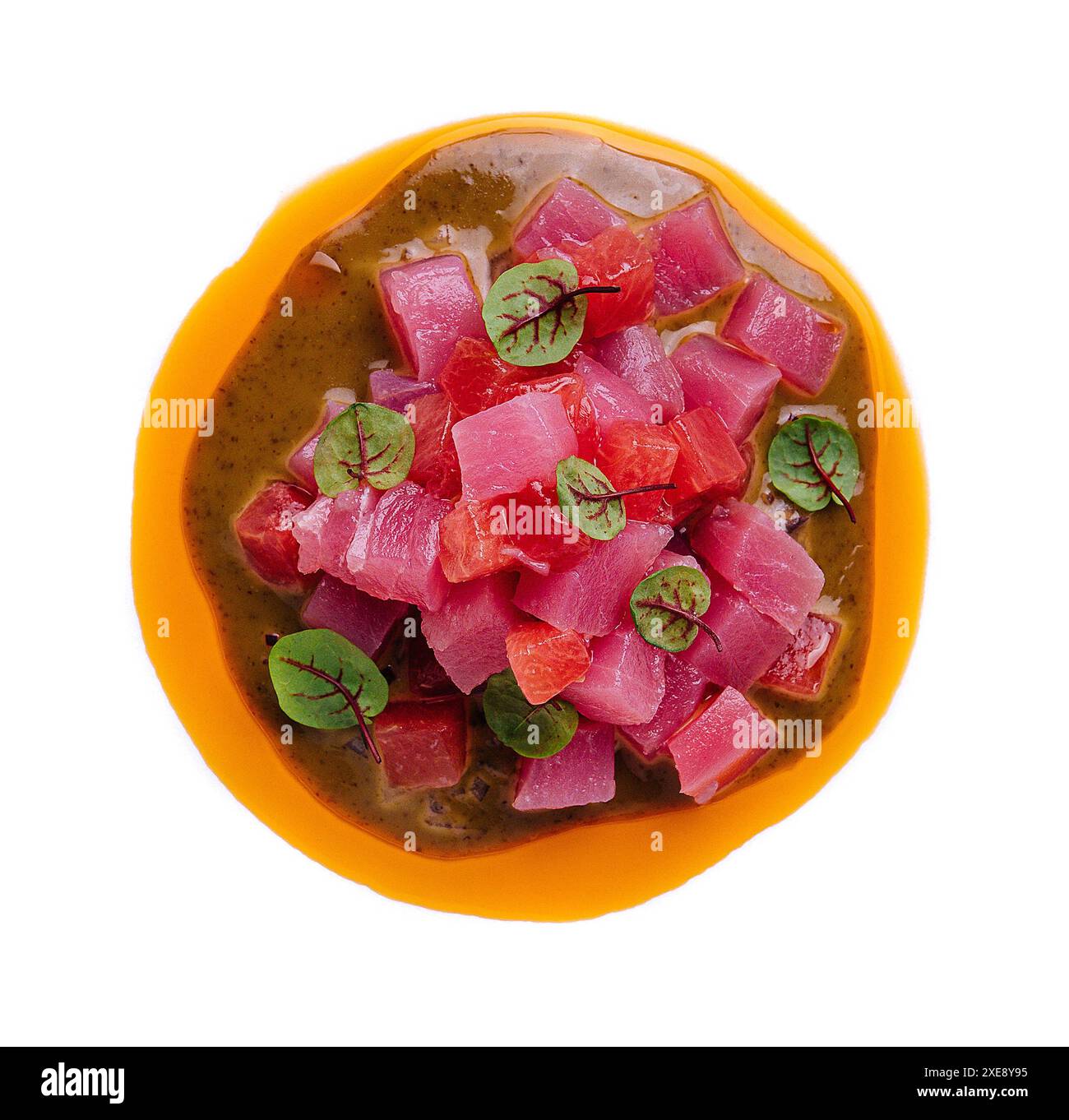 Tuna tartare with micro beetroot leaves Stock Photo - Alamy