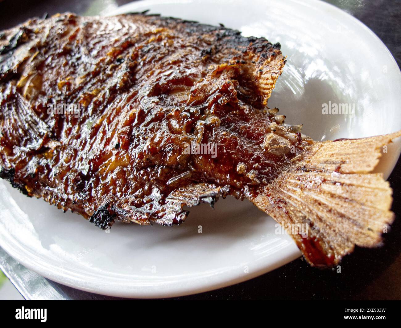 Barbeque fish hi-res stock photography and images - Alamy