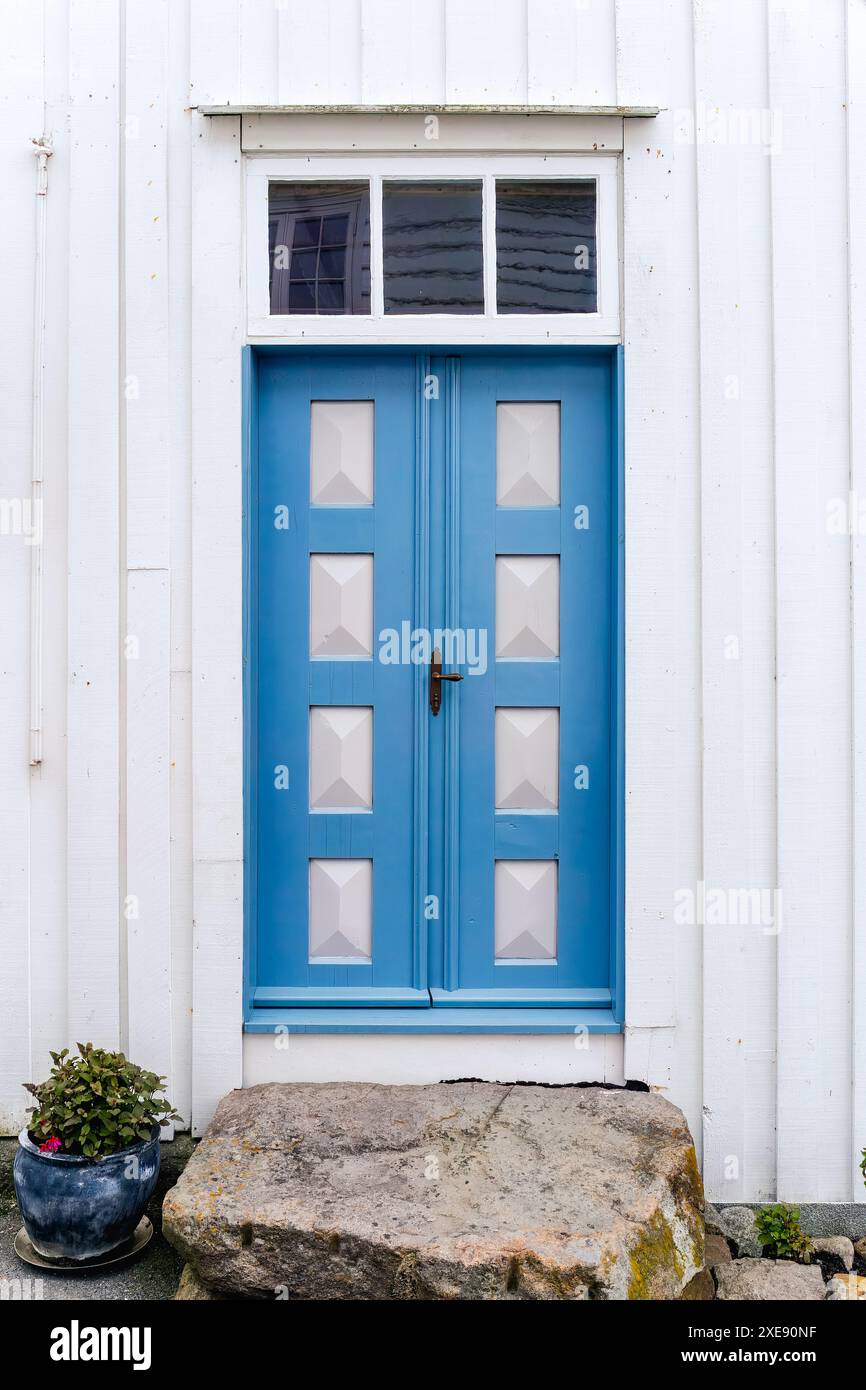 Beautiful blue wooden door , traditional white building, Scandinavian ...