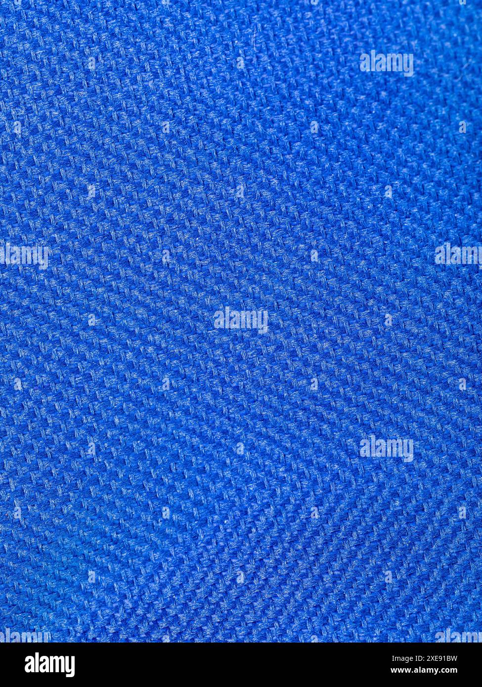 Flat fabric surface texture in blue color Stock Photo - Alamy