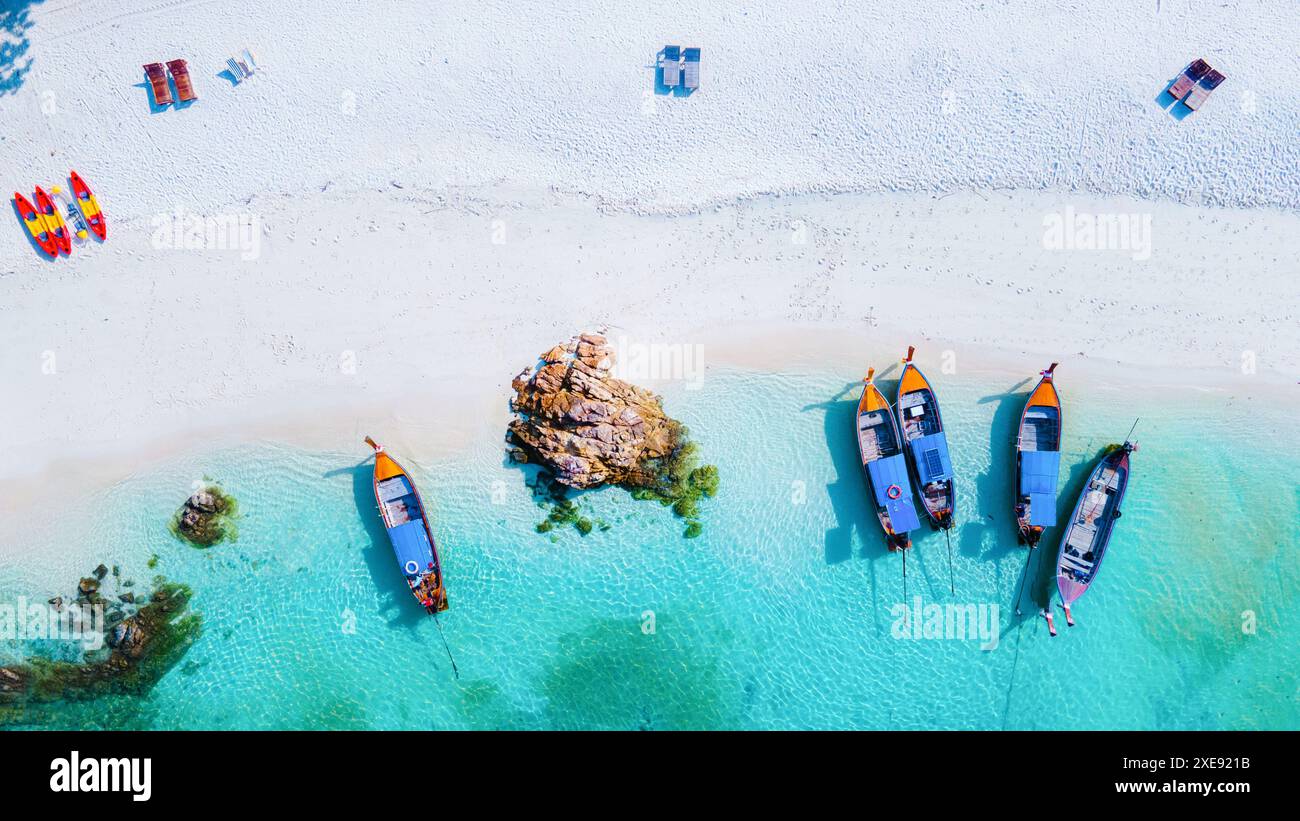 Top view at longtail boats on the beach of Koh Lipe Island Thailand ...