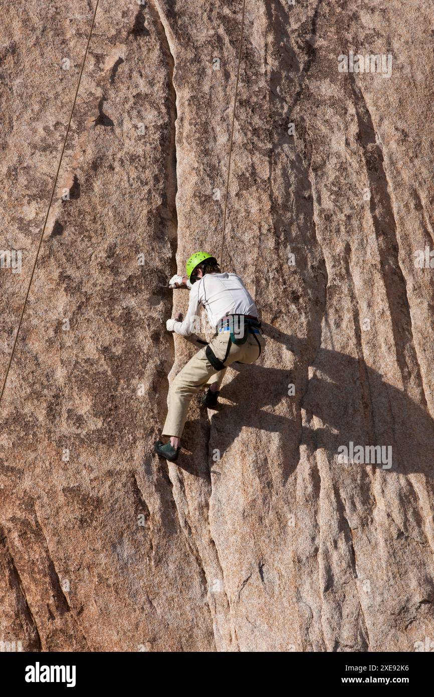 Closeup of climber on rock face Stock Photo - Alamy