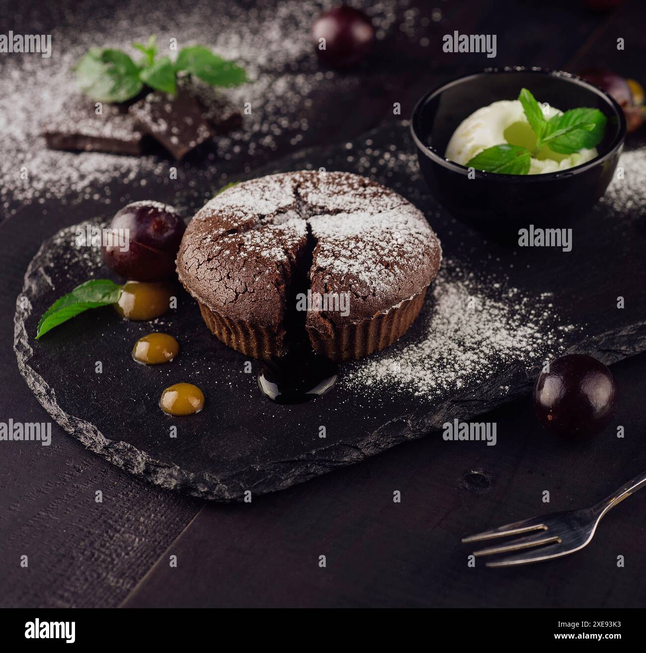 Delicious molten chocolate lava cake with vanilla ice cream Stock Photo ...