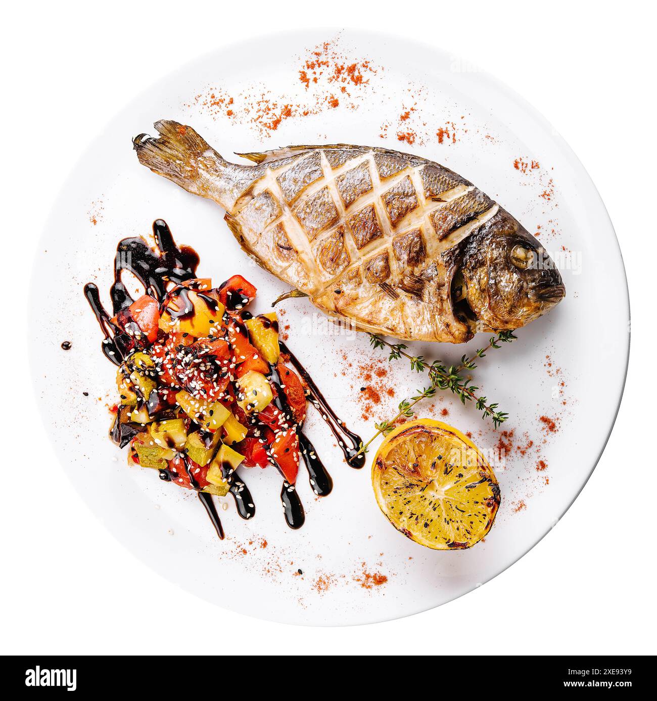 Grilled dorado fish vegetables Cut Out Stock Images & Pictures - Alamy