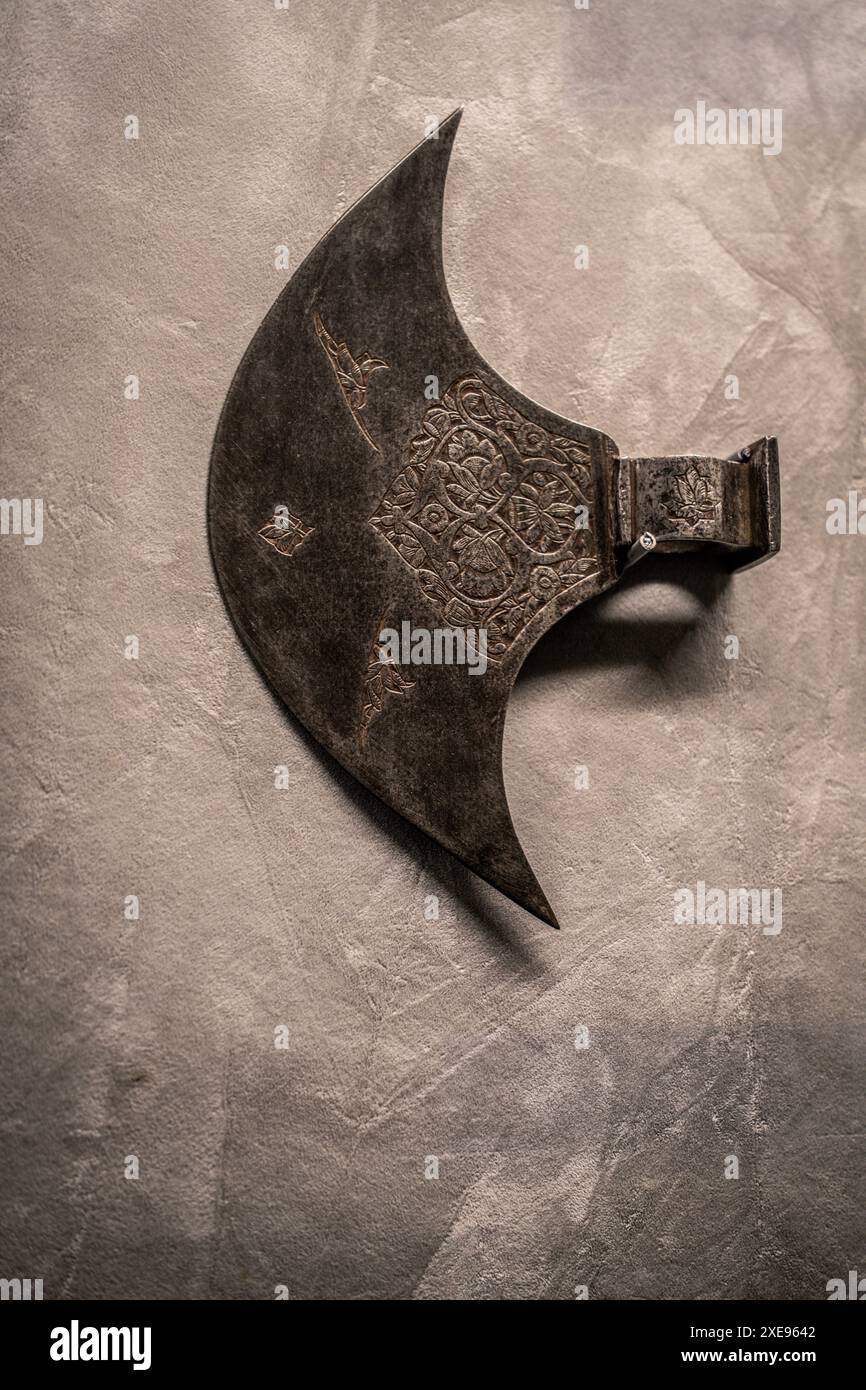 Ax with flower engraving Stock Photo - Alamy