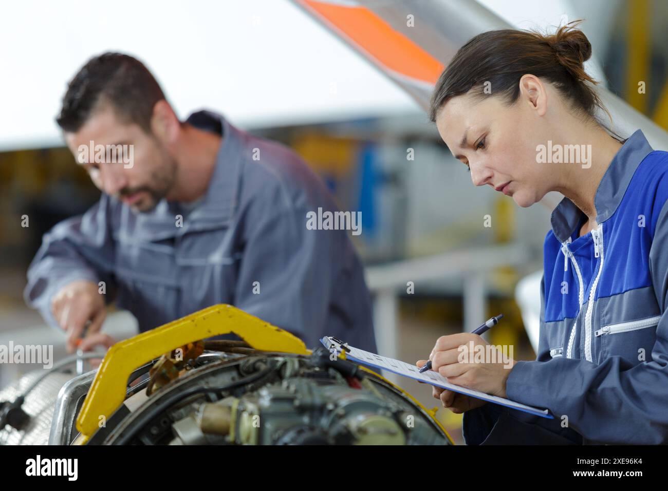 Male female workers maintenance hi-res stock photography and images - Alamy