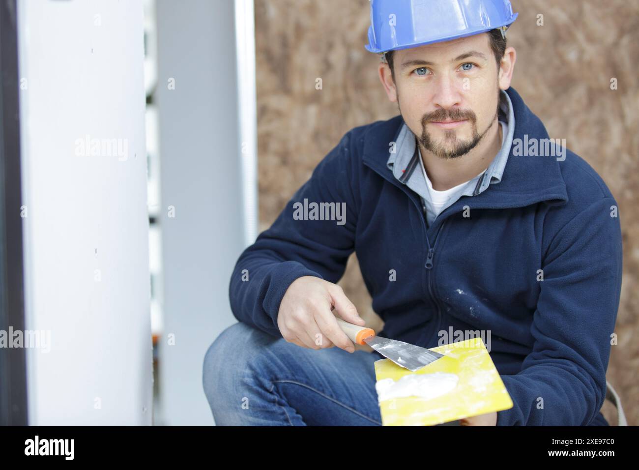 construction worker with trowel and float Stock Photo - Alamy