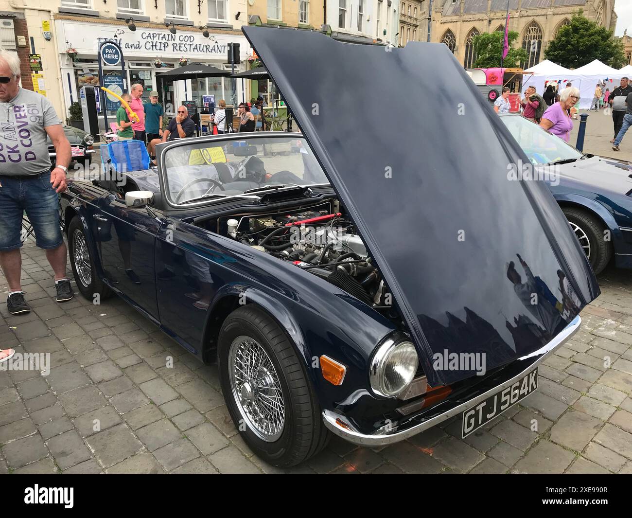 Triumph TR6 soft top with the bonnet open at a classic car show in the ...