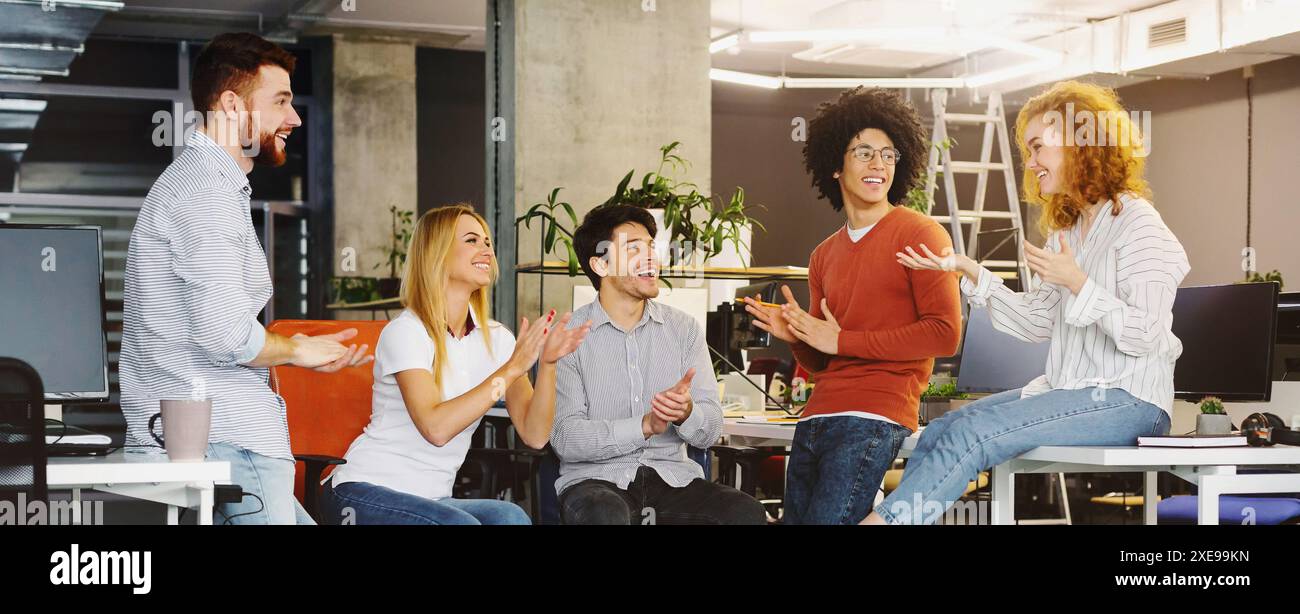 Group multiethnic business people applauding to new member of team ...