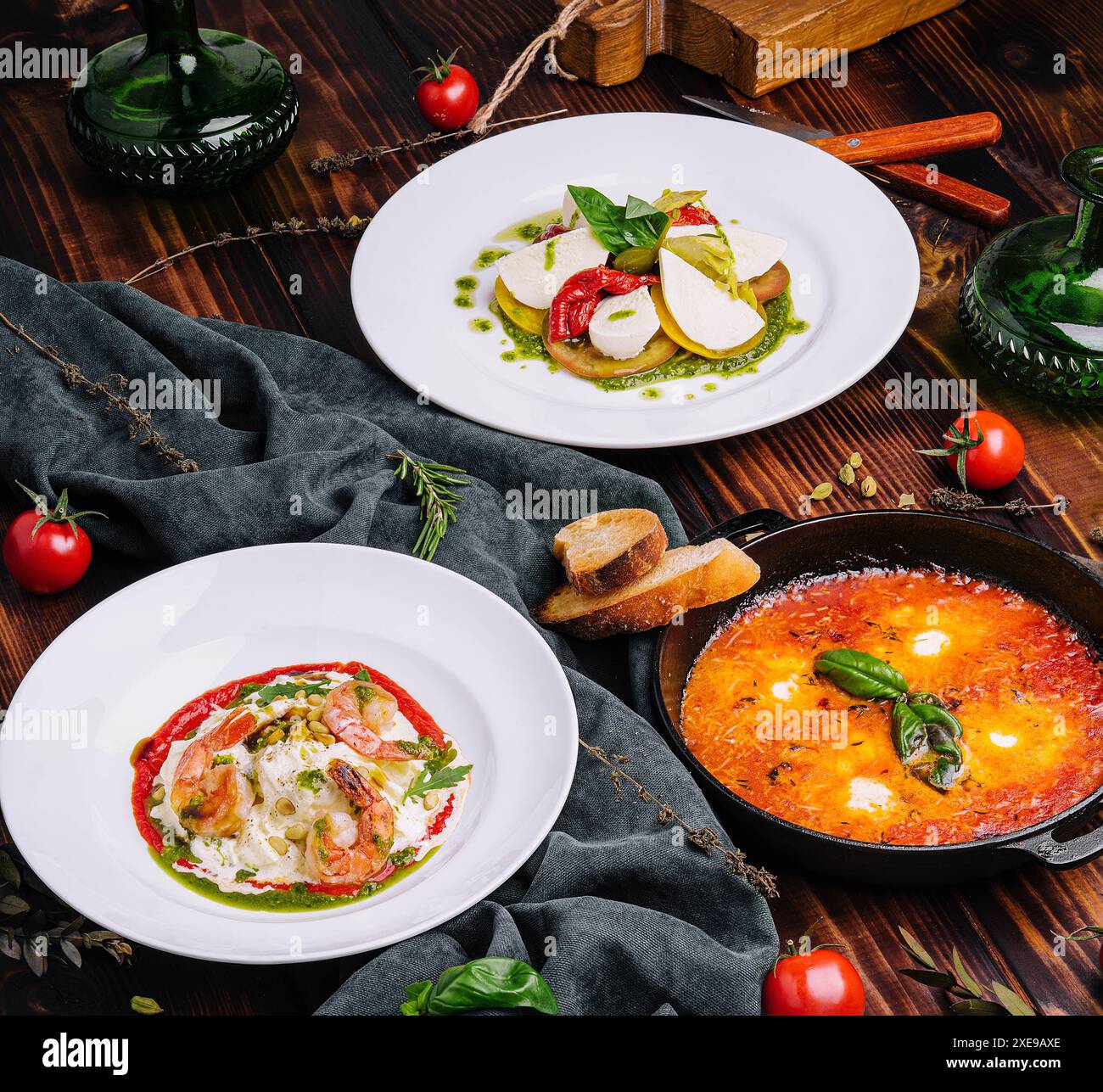Different types of italian dishes on a large wooden table Stock Photo ...
