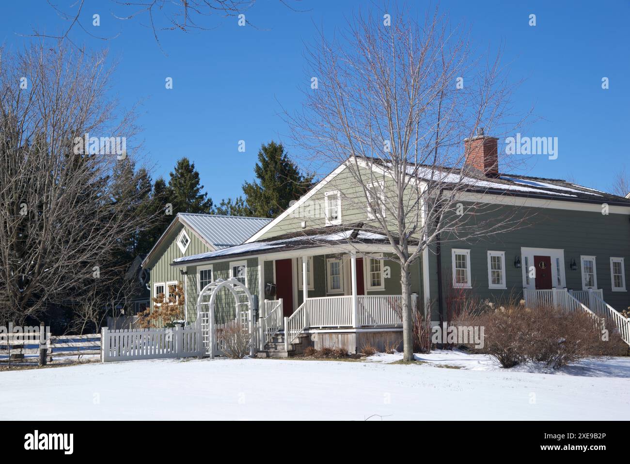 Side view of a Victorian-style house exterior in a Canadian village in ...