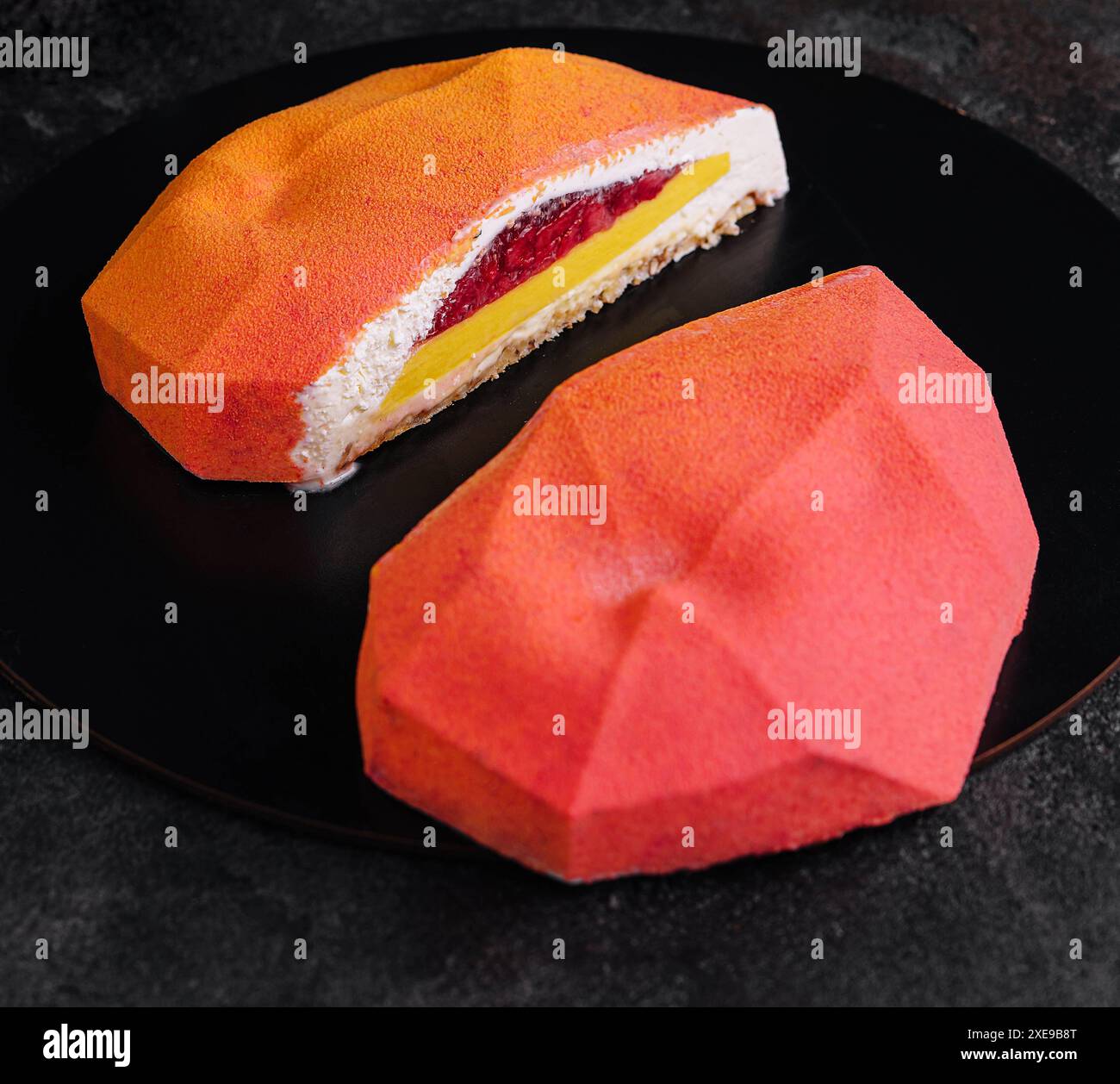 Strawberry mango mousse cake on plate Stock Photo - Alamy