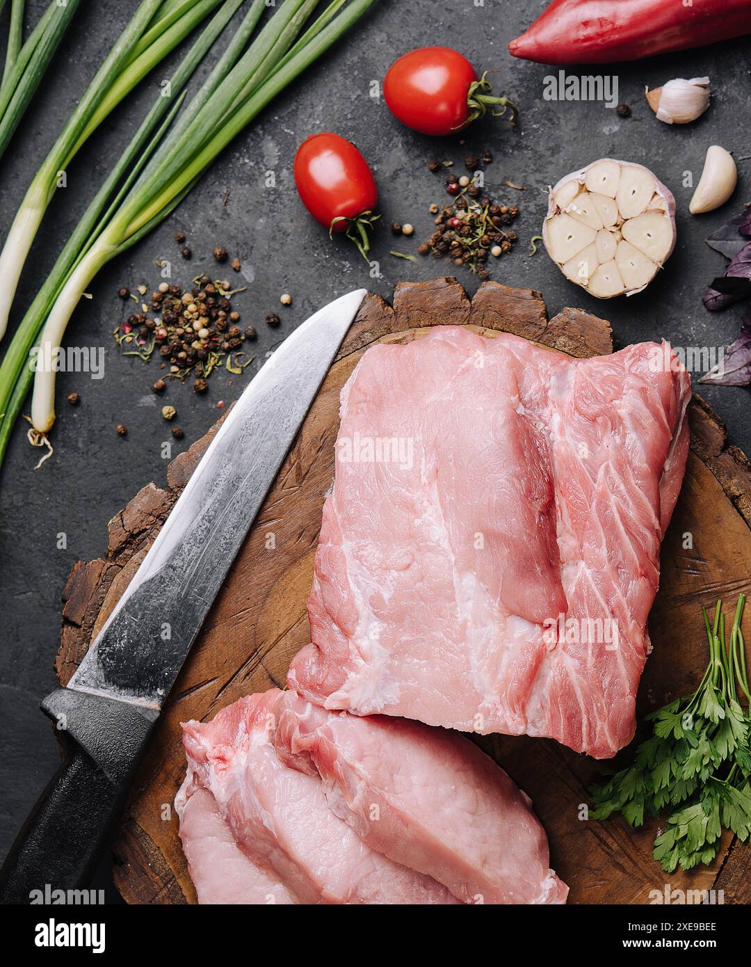 Raw pork neck meat cuts with spices Stock Photo - Alamy