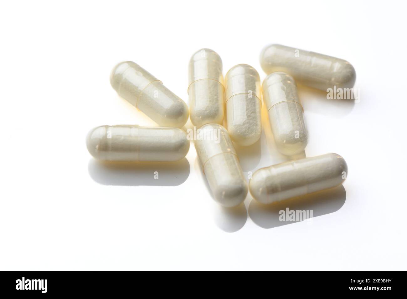 vitamins in capsules on a white background 1 Stock Photo - Alamy