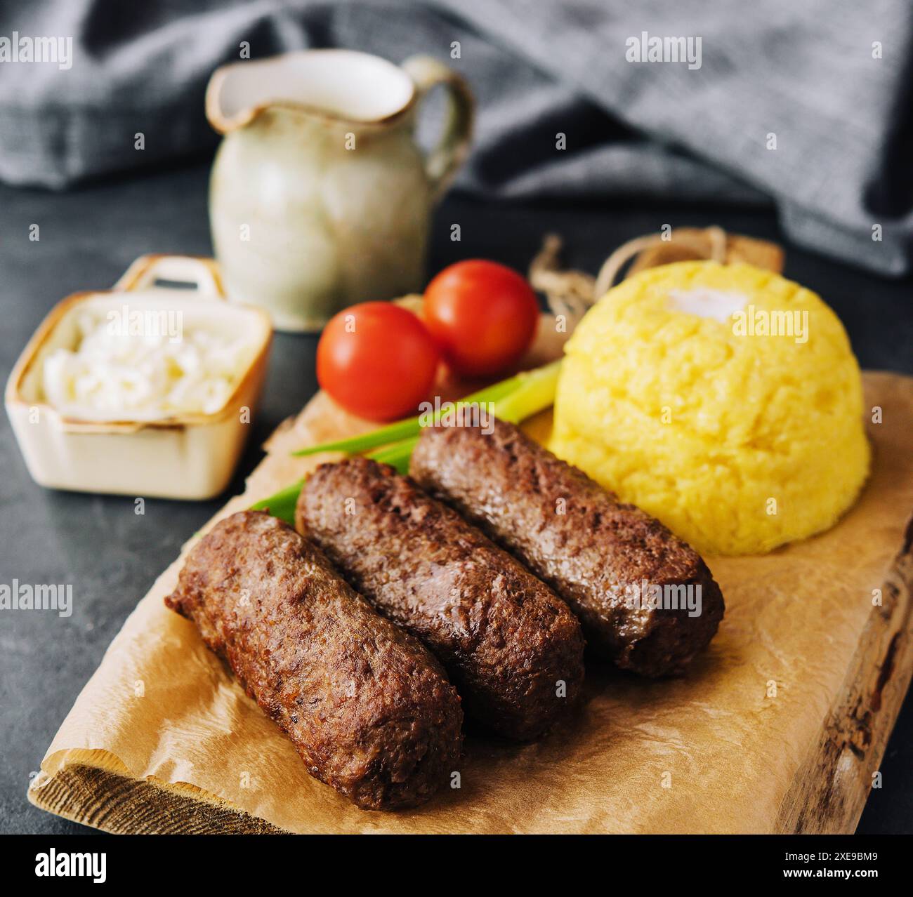 Traditional romanian grilled dish - mici or mititei Stock Photo - Alamy