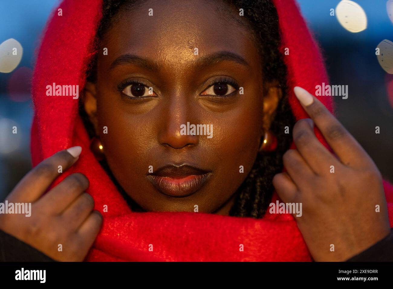 Resolute Gaze Amidst City Lights Stock Photo - Alamy