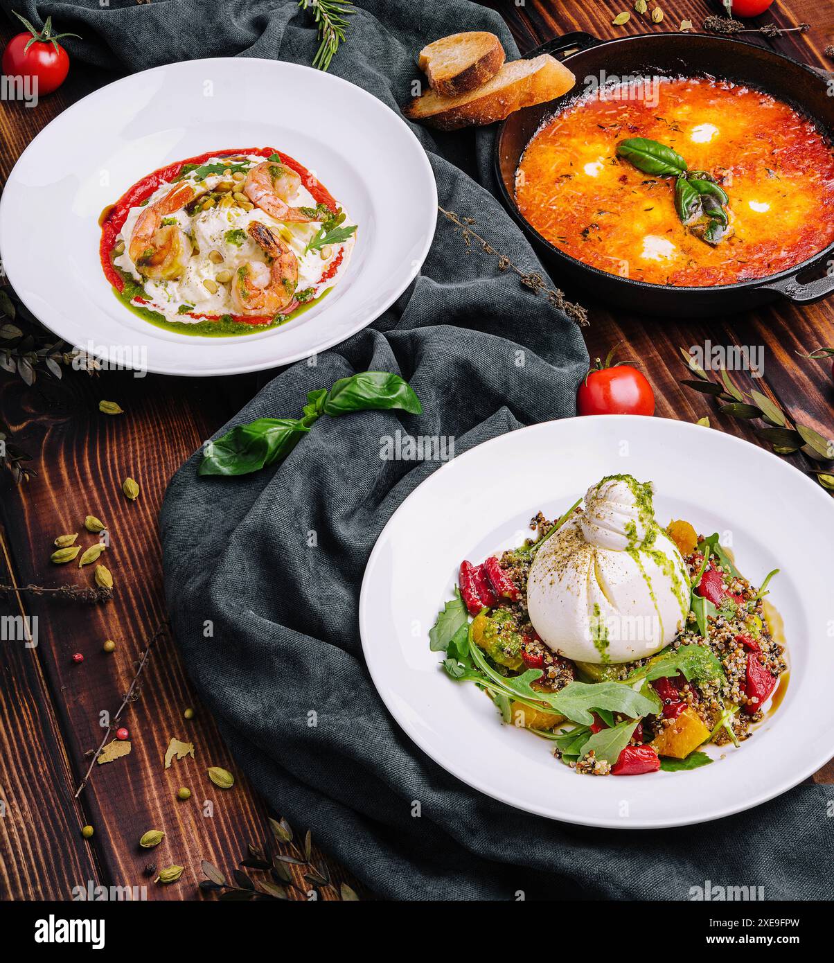 Different types of italian dishes on a large wooden table Stock Photo ...