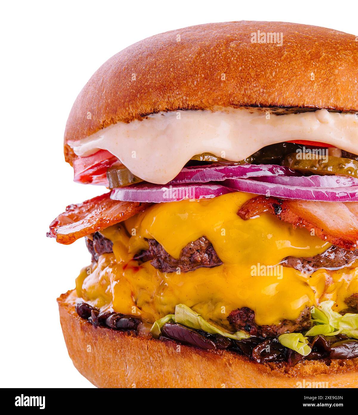 Bacon cheese burger with beef patty tomato onion Stock Photo - Alamy