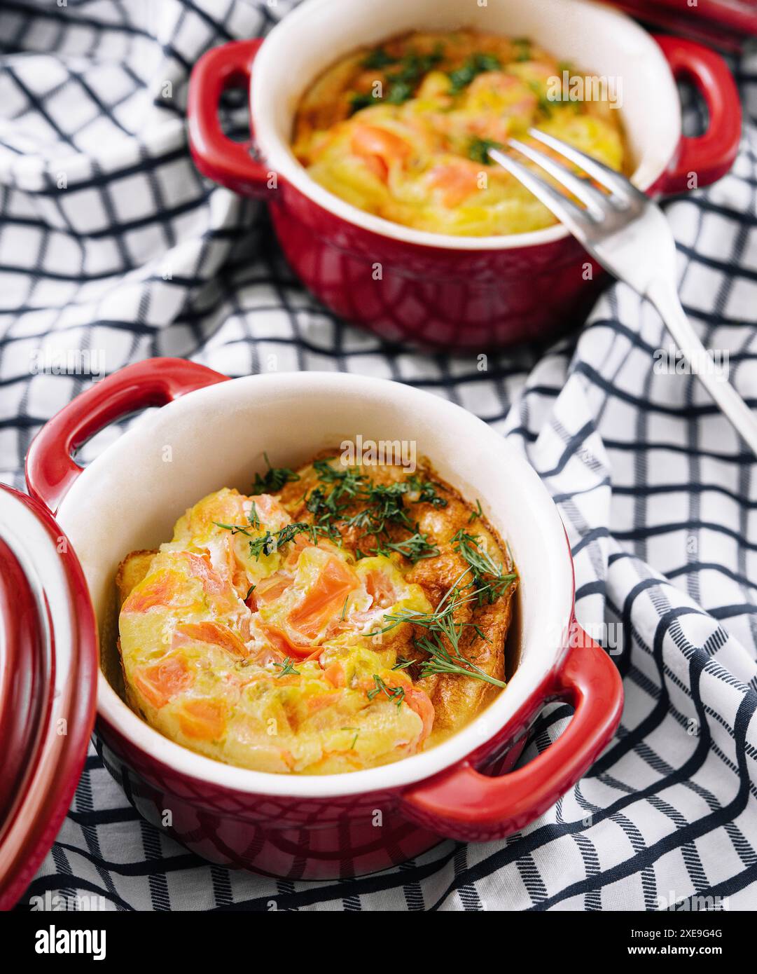 Quiche with salmon and vegetables on bowl Stock Photo - Alamy