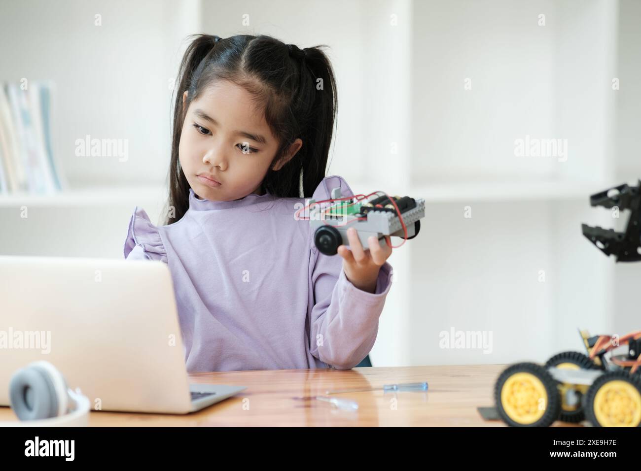 STEM education concept. Asian young girl learning robot design Stock ...