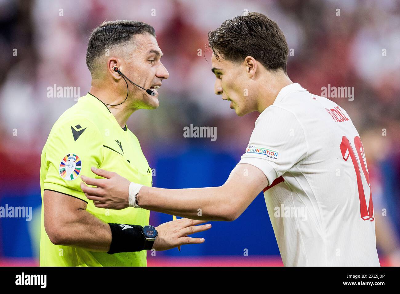 Hamburg, Germany. 26th June, 2024. Referee Istvan Kovacs seen with ...