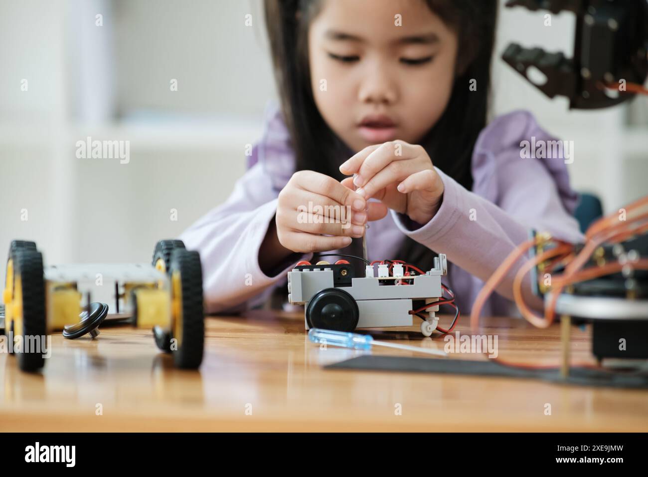 STEM education concept. Asian young girl learning robot design Stock ...